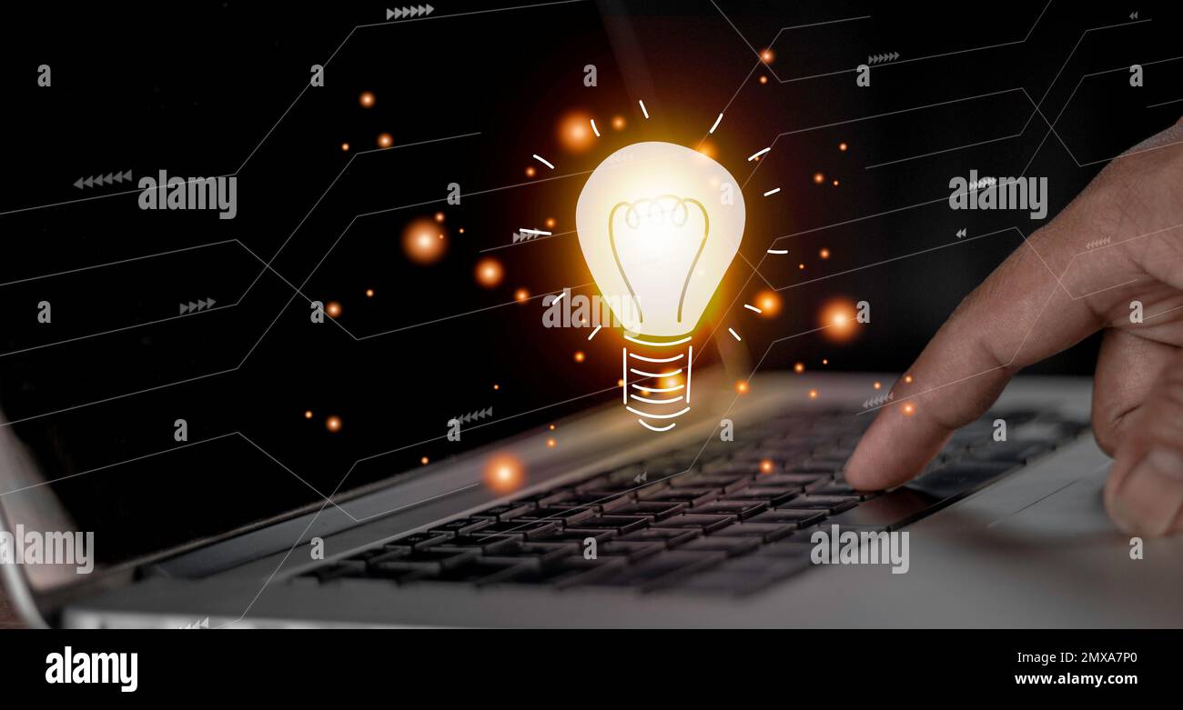 hand holding light bulb. idea concept with innovation and inspiration. Bulb light drawing idea ...