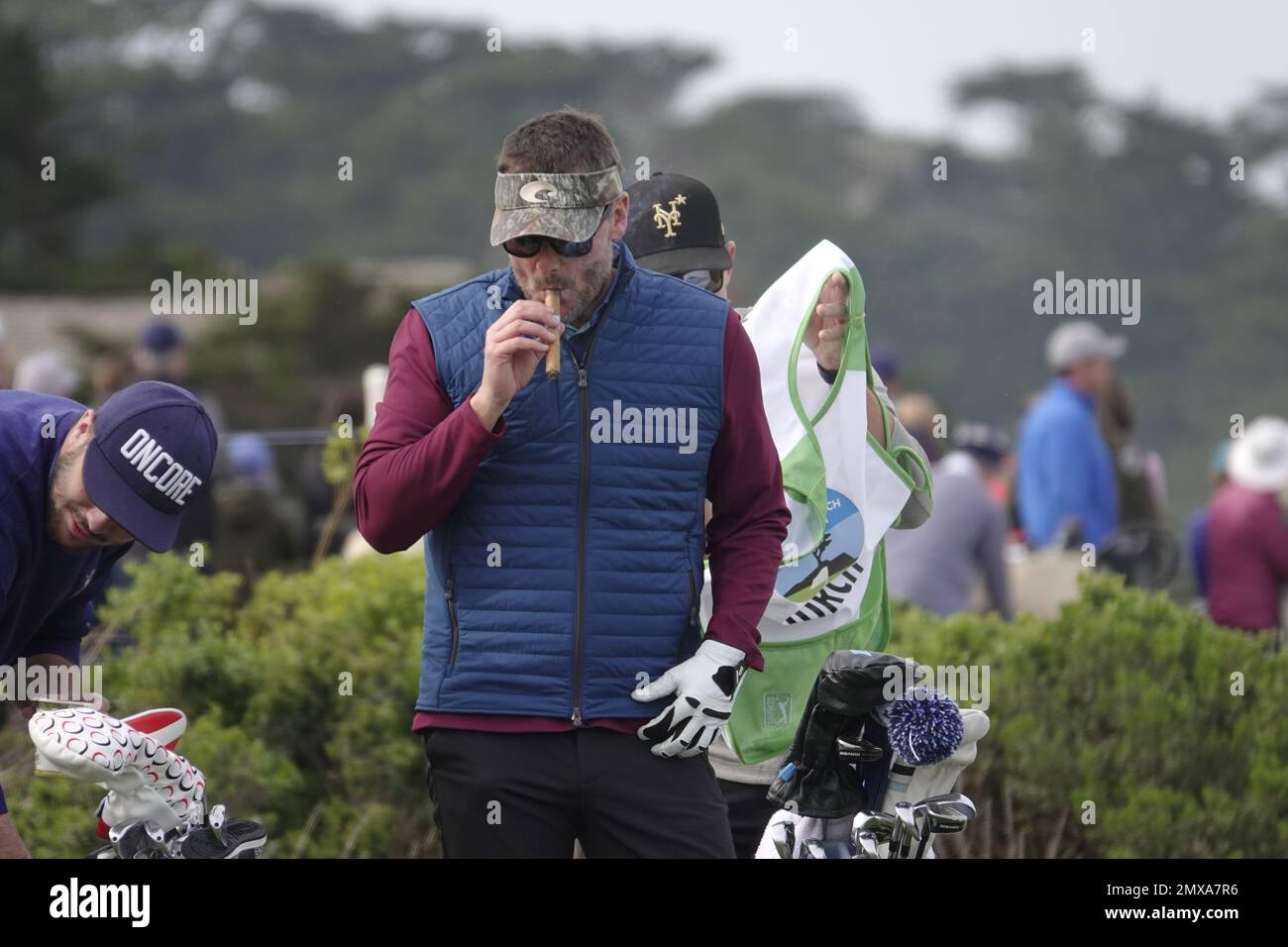 Pebble Beach, CA, USA. 2nd Feb, 2023. Eric Church smokes his cigar on ...
