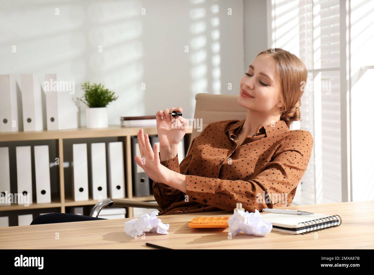 Woman doing nails office hi-res stock photography and images - Alamy