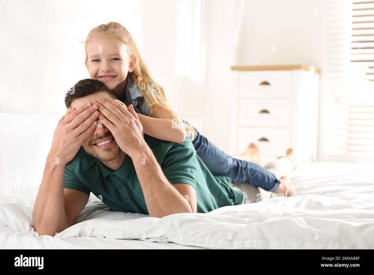 Hiding daddy hi-res stock photography and images - Alamy