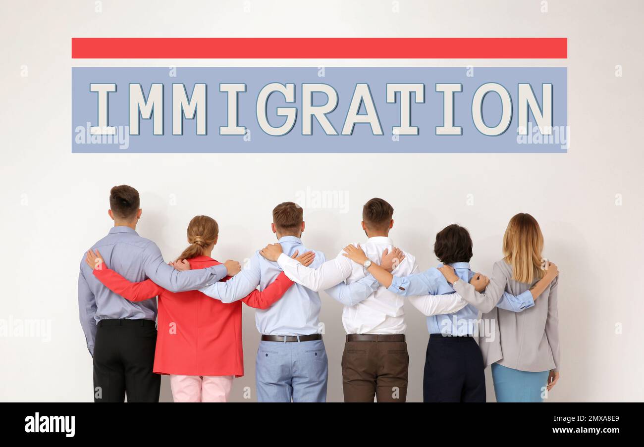 Immigration concept. Group of young people hugging each other near ...