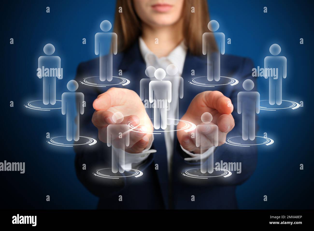 Woman demonstrating virtual structure of organization, focus on hands ...