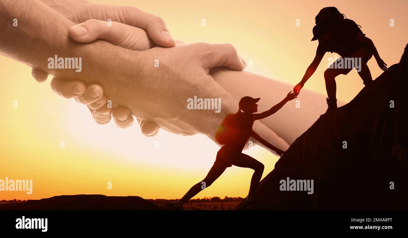 Helping hand mountain climbing hi-res stock photography and images - Alamy