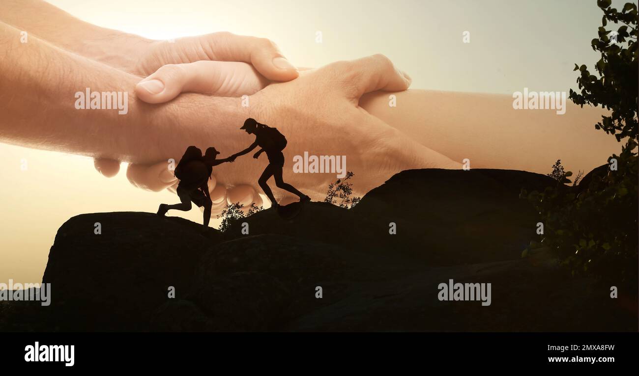 Helping hand mountain climbing hi-res stock photography and images - Alamy