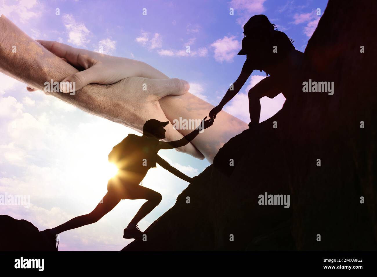Helping hands mountain climbing hi-res stock photography and images - Alamy