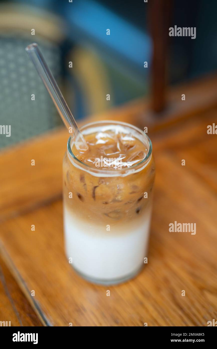 delicious milkshakes on the bar counter in a glass jar with a straw ...