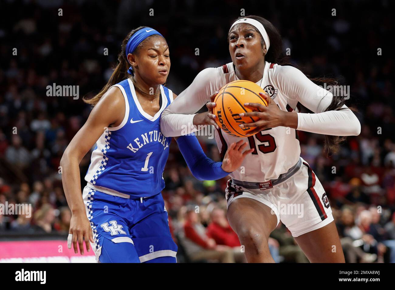 South Carolina forward Laeticia Amihere, right, drives past Kentucky ...