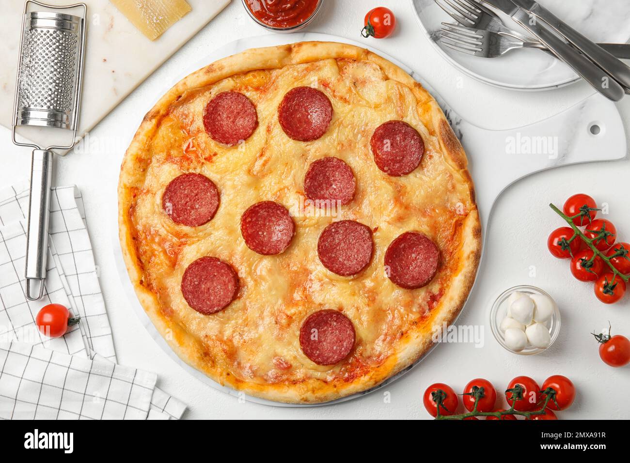 Flat lay composition with tasty pepperoni pizza on white table Stock ...