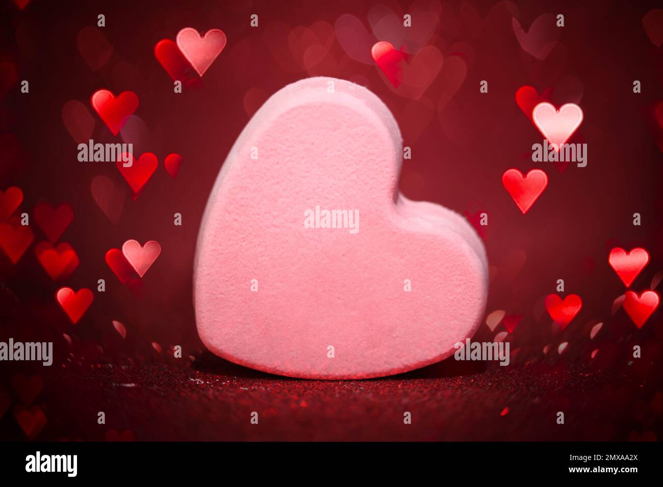 Single large blank candy heart for Valentines day surrounded with shiny ...