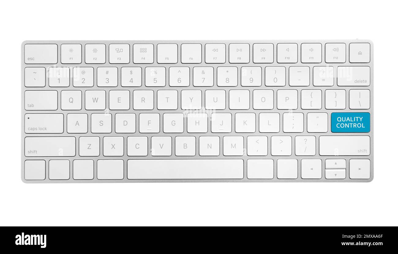Modern computer keyboard and quality control button isolated on white ...