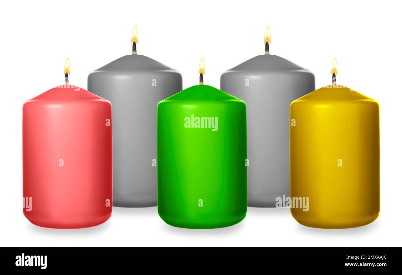 Set of burning color candles on white background Stock Photo - Alamy