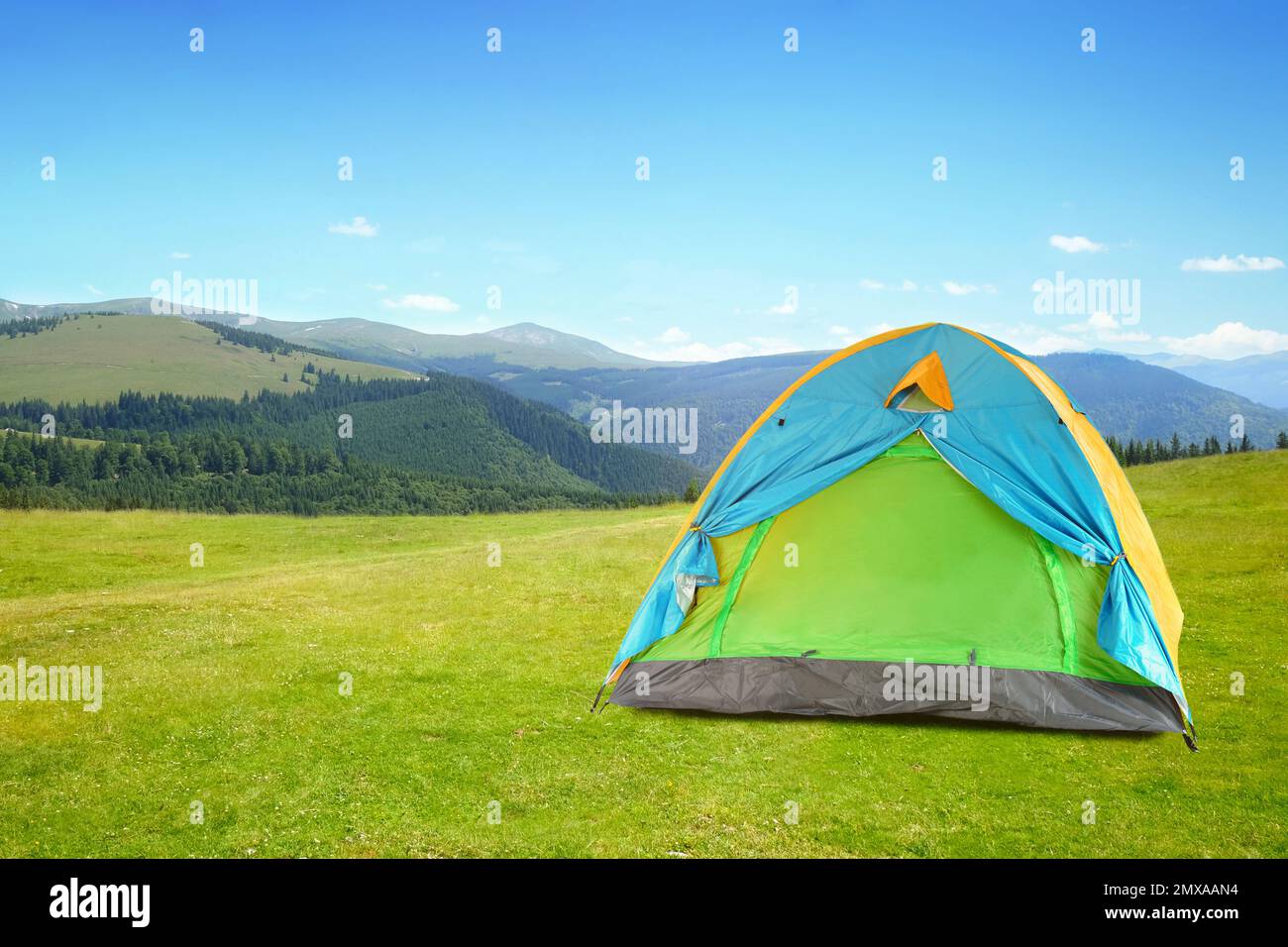 Modern camping tent in mountains on sunny day Stock Photo - Alamy