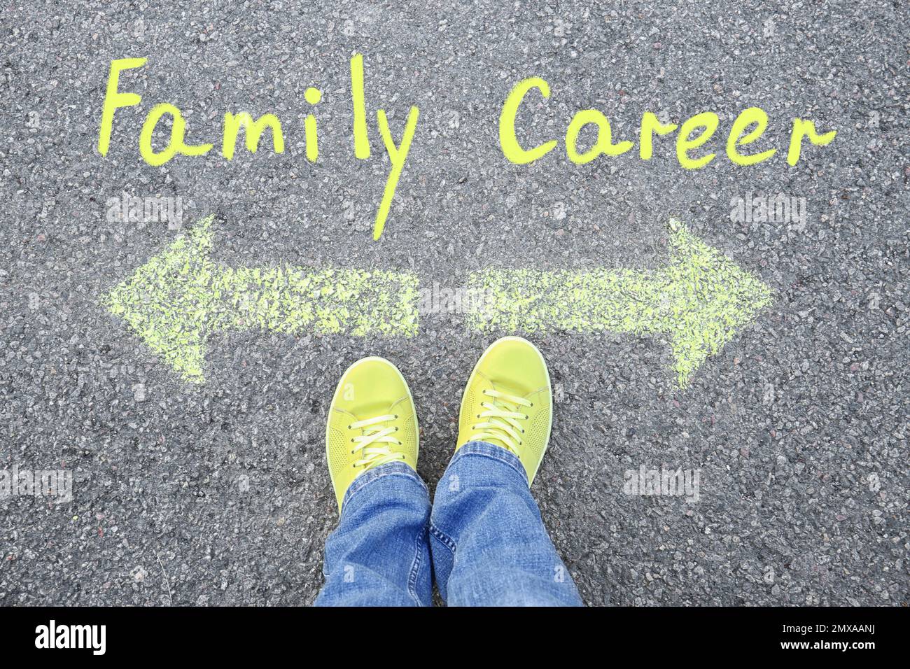 Life choice. Woman on road near arrows with directions to family and ...