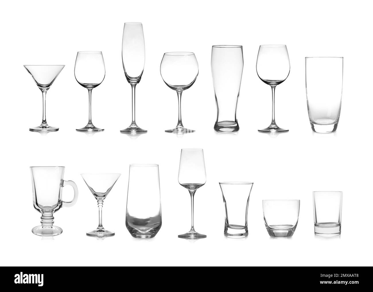 Set of different empty glasses on white background Stock Photo - Alamy