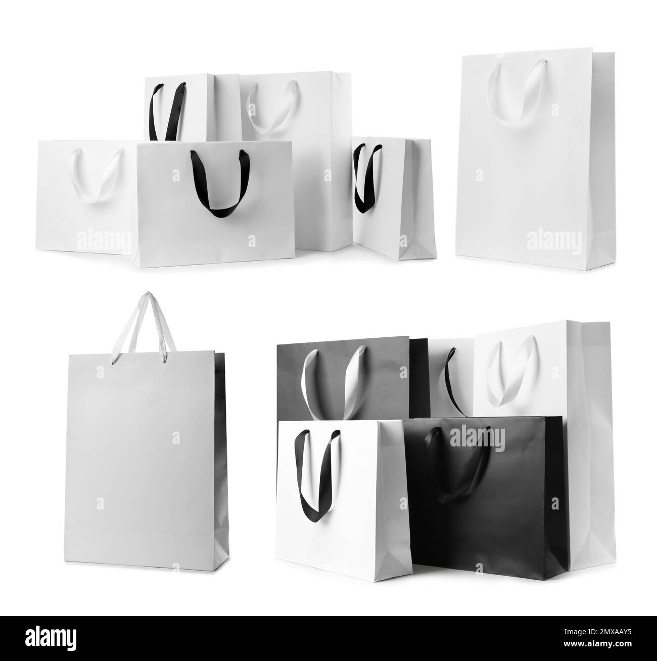 Set with different paper shopping bags on white background Stock Photo ...