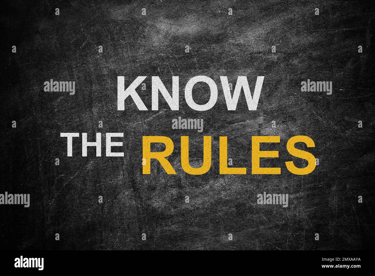 Phrase Know the rules on black chalkboard Stock Photo - Alamy
