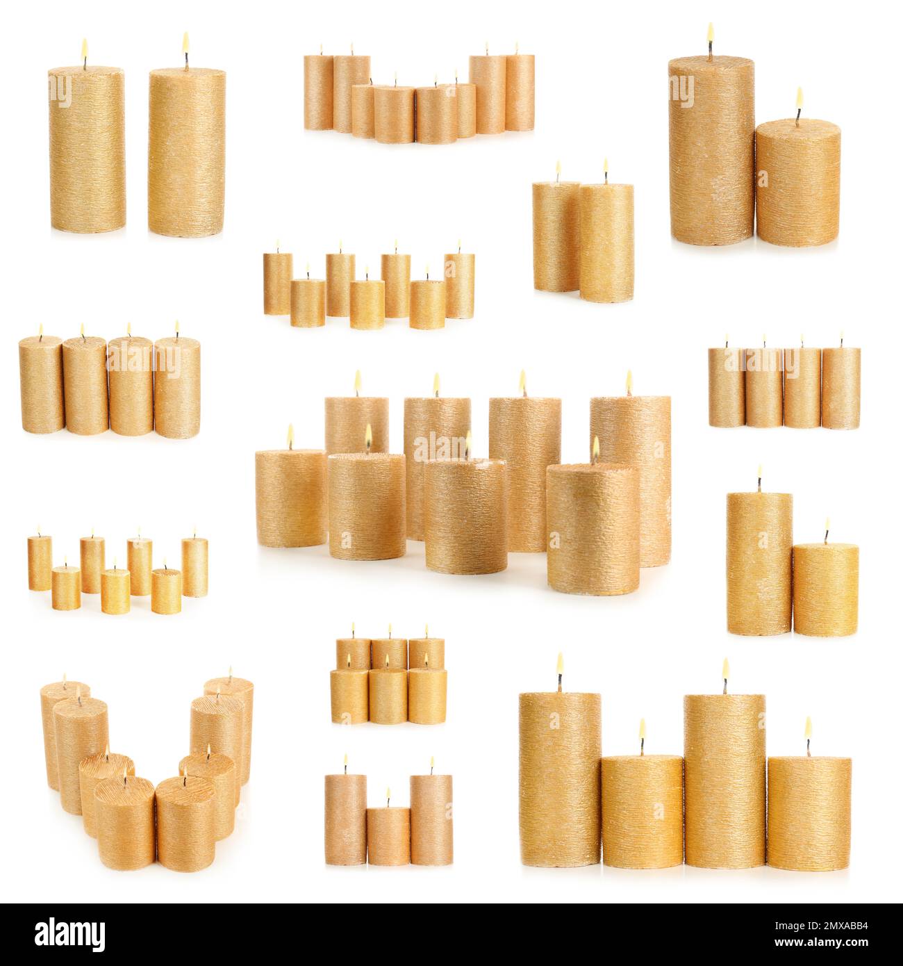 Set of burning gold candles on white background Stock Photo - Alamy