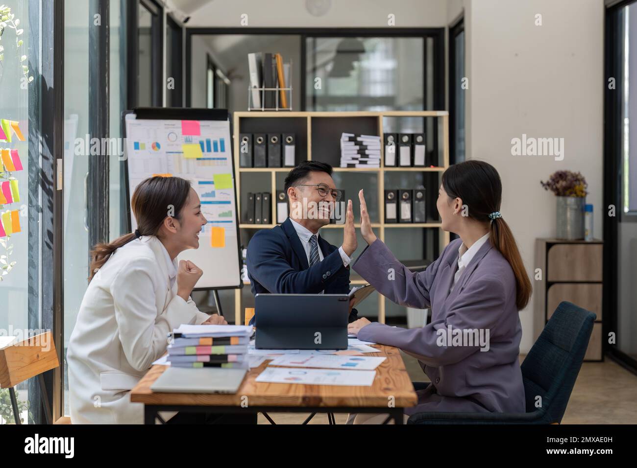 Group of Young Asian business team creative businesspeople coworker in ...