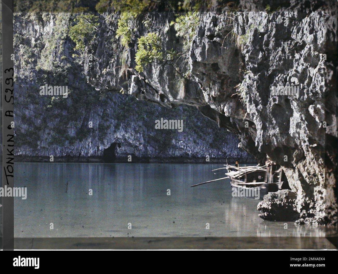 Ha-Long bay, Tonkin, Indochina a sampan accosted at the entrance to the ...