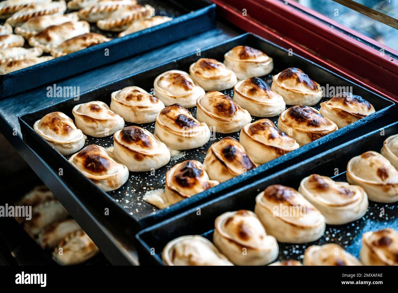 Empanadas on a table in a street cafe in Buenos Aires. Traditional food ...