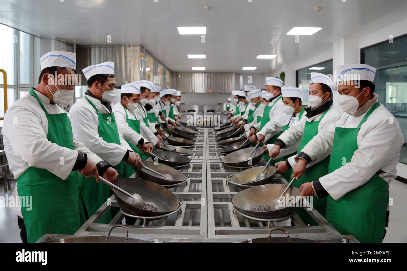 AKSU, CHINA - FEBRUARY 2, 2023 - Students learn cooking skills at a ...