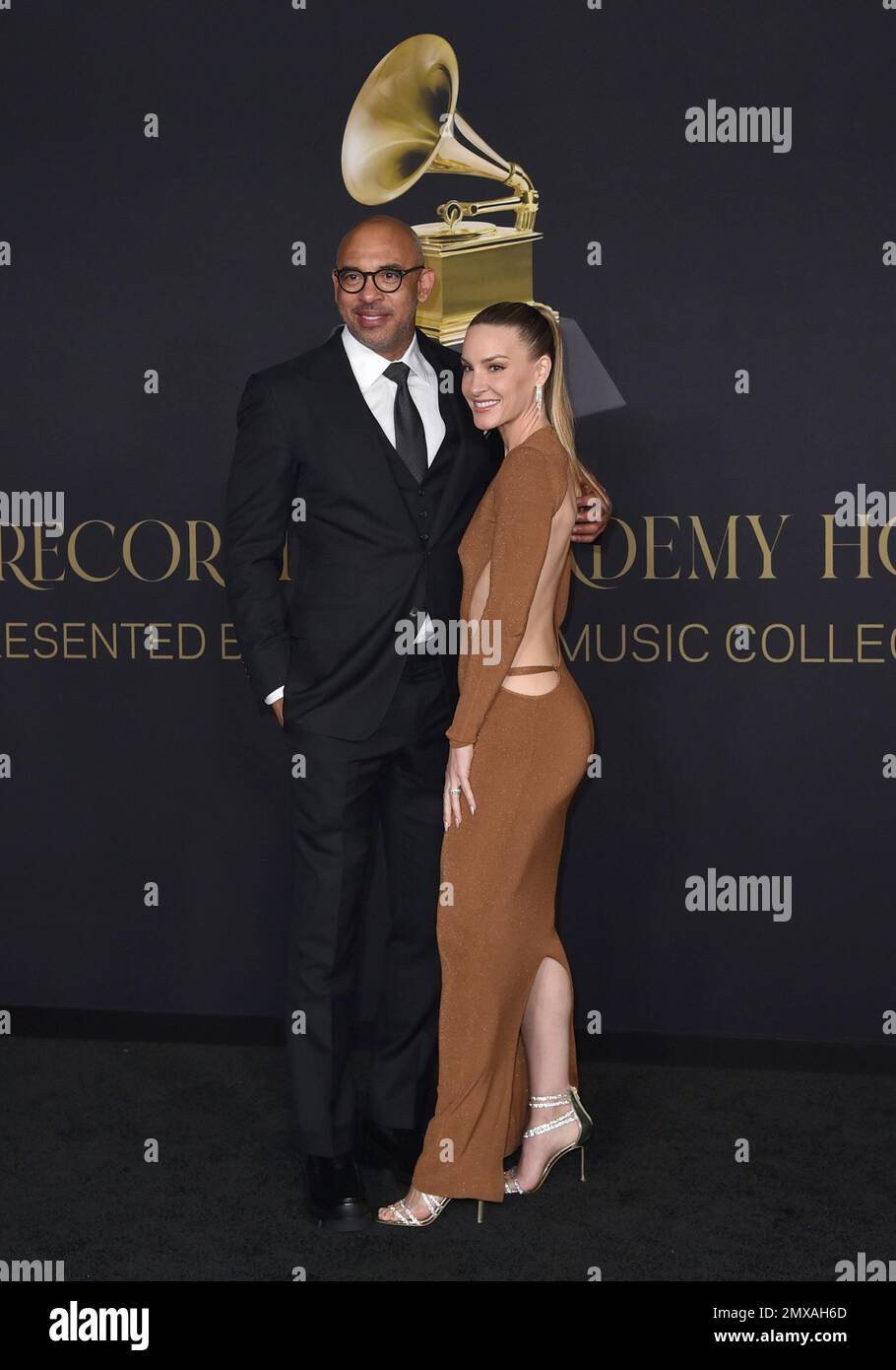 Harvey Mason Jr., CEO of the Recording Academy, left, and Britt Burton ...