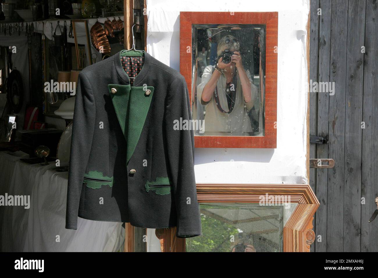 Traditional traditional costume jacket hangs on hanger for sale at flea ...