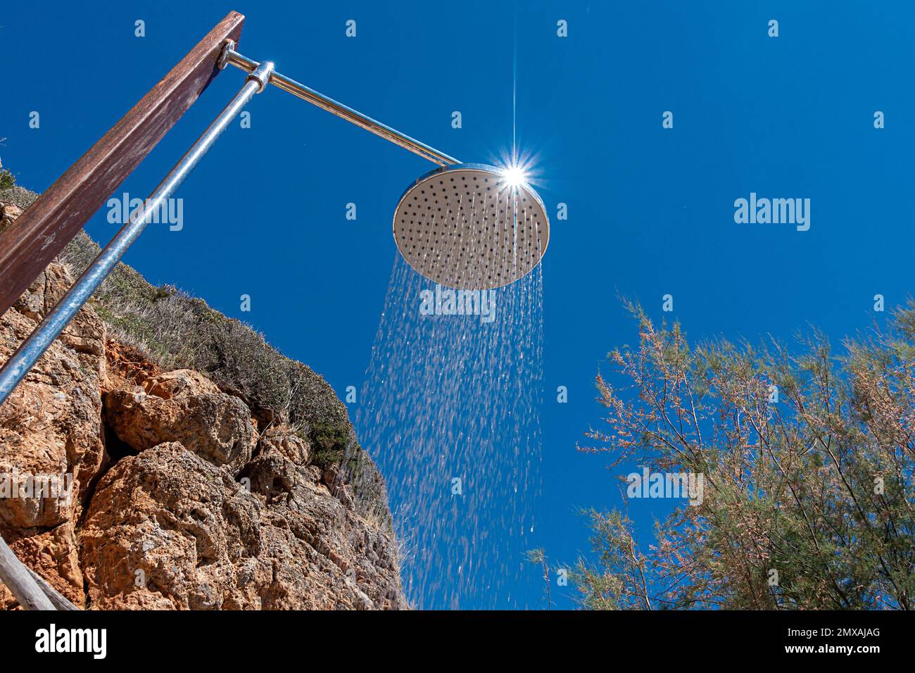 Shower on the beach, Crete, Greece Stock Photo - Alamy