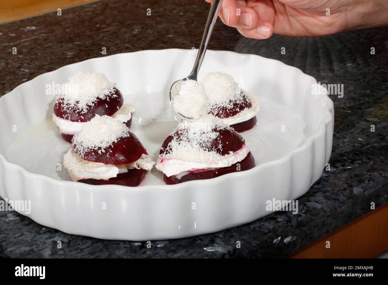 Southern German cuisine, preparation goat cheese beetroot burger, man's ...