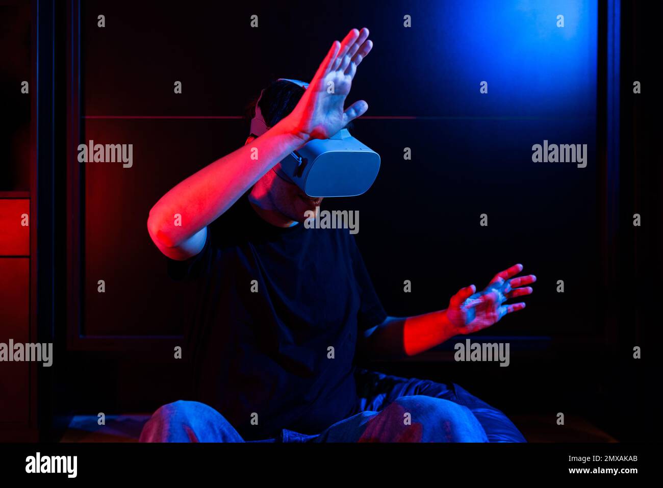 Gamer Man Wearing Virtual Reality Goggles Stock Photo - Alamy