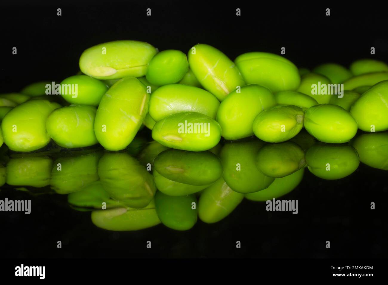 Peeled fresh Japanese edamame beans, studio photography with black ...