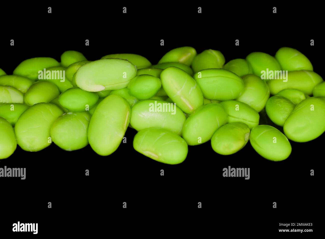 Peeled fresh Japanese edamame beans, studio photography with black ...