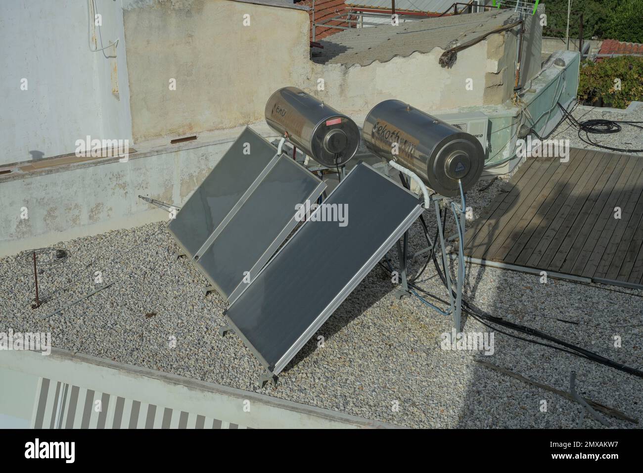 Solar hot water system, roof, Chania, Crete, Greece Stock Photo - Alamy