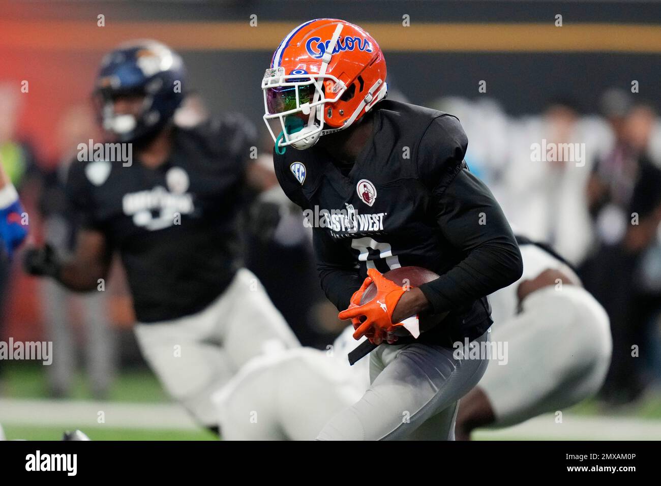 West safety Trey Dean III of Florida runs after making an interception ...