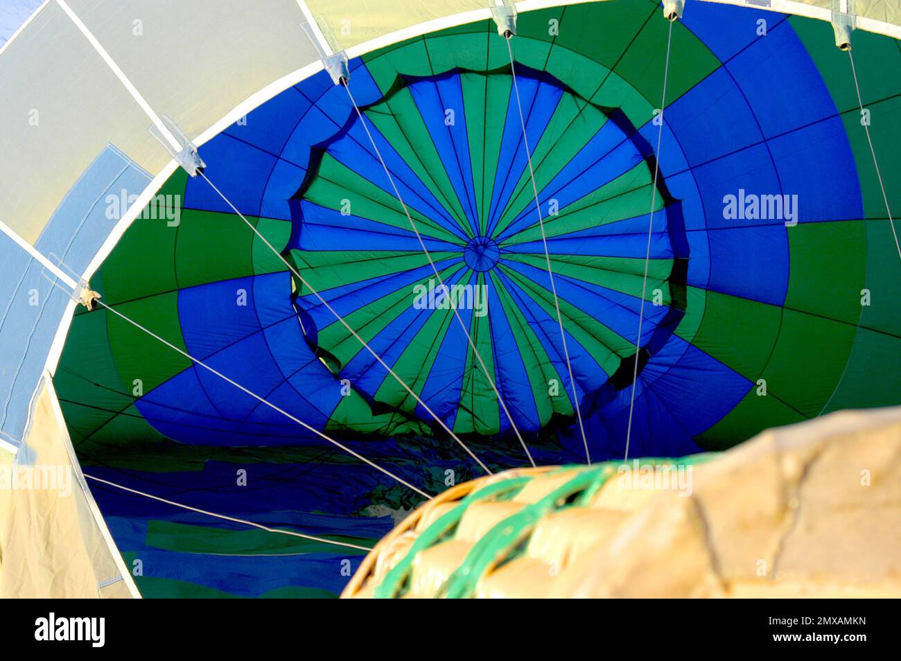 Hot Air Balloon getting inflated on the ground Stock Photo - Alamy