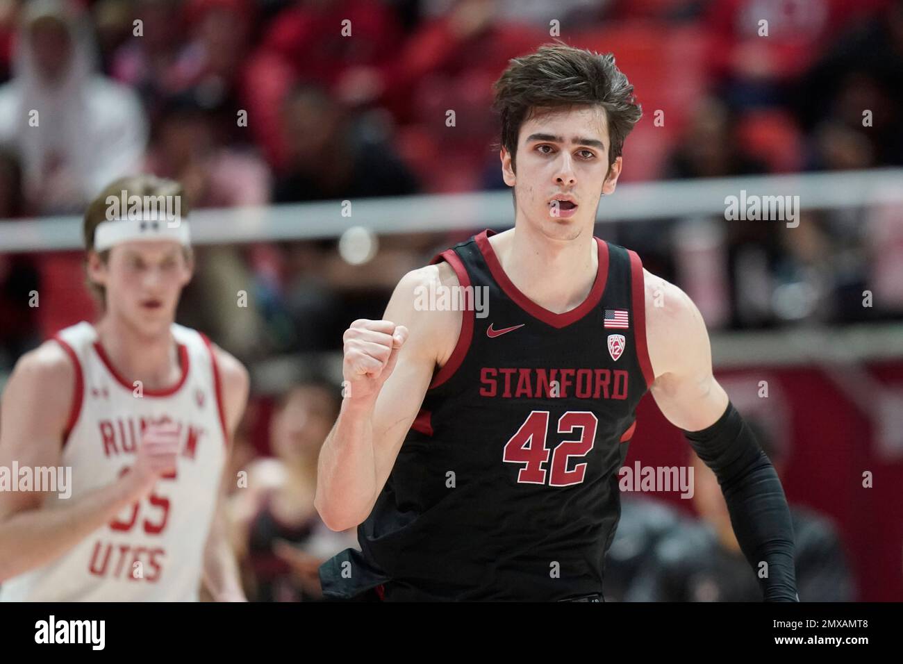 Stanford forward Maxime Raynaud (42) reacts after making a 3-point ...
