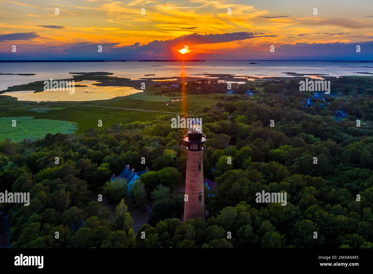 Aerial view of Currituck Beach Lighthouse at sunset near Corolla, North ...