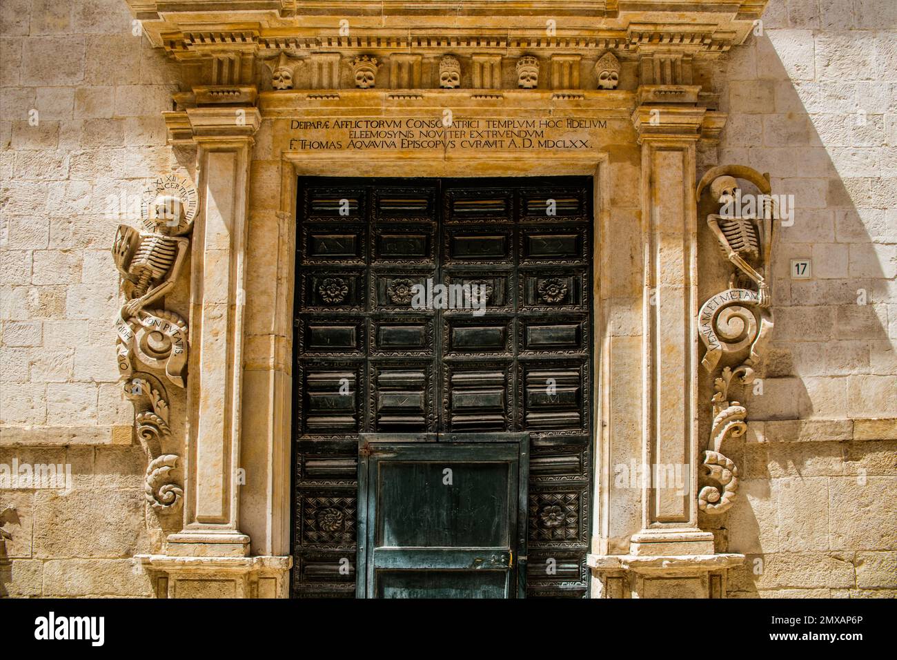 Chiesa del Purgatorio with its portal decorated with skeletons and ...
