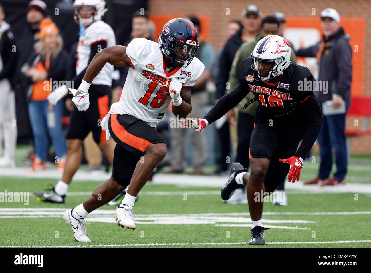 American wide receiver Jonathan Mingo of Mississippi (18) and American ...