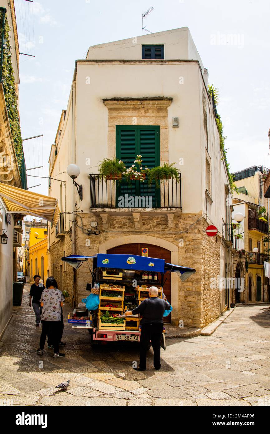 Old town alleys with greengrocers, Bitonto, Puglia, Puglia, Italy Stock ...