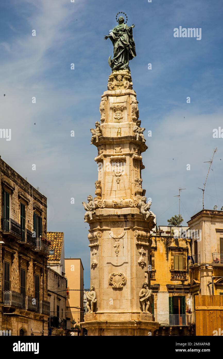 Statue of the Virgin Mary in front of the Cathedral of San Valentino ...