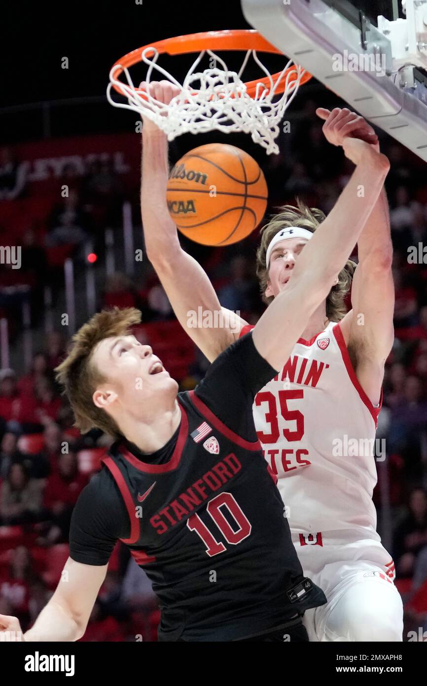 Utah center Branden Carlson (35) dunks against Stanford forward Max ...