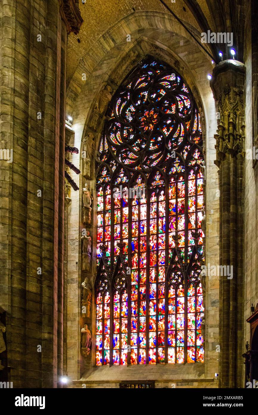 14th century Milan Cathedral stained glass windows in white marble ...