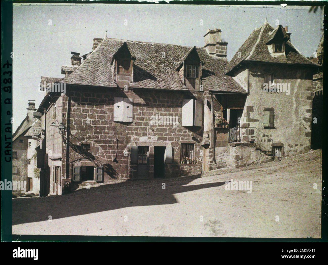 (French - ﻿Vic-sur-Cère , France Les maisons sur la place de l' église ...