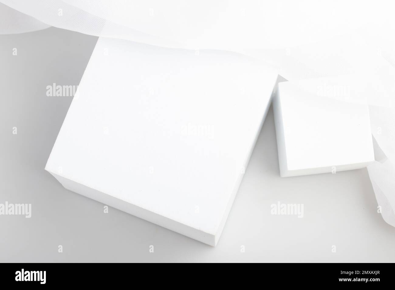 Square white product display for product advertising Stock Photo - Alamy