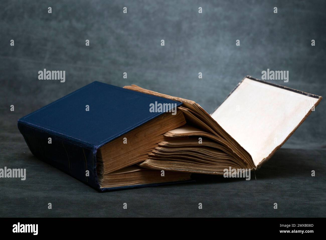 Two old books bound together in close-up on the table Stock Photo - Alamy
