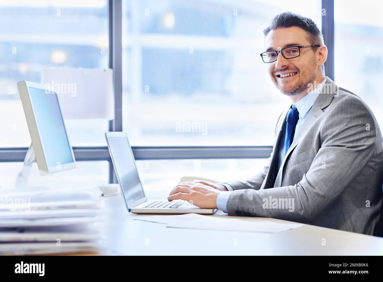 I may have the best job in the world. Portrait of a smiling businessman ...