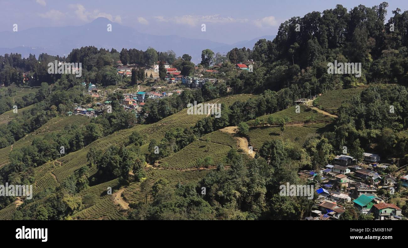 mountain village and terrace farming on slopes of himalayan foothills ...