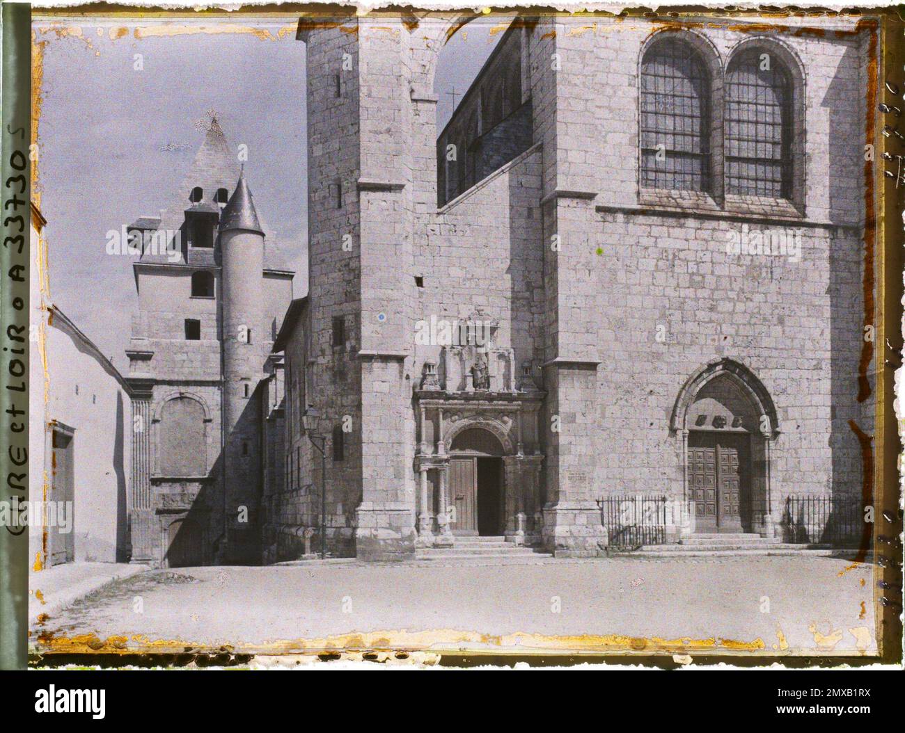 Chartres, France The turret and the western facade of the Saint-Aignan ...