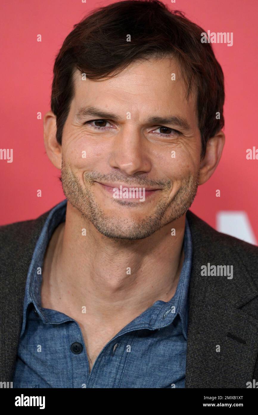 Ashton Kutcher arrives at the world premiere of "Your Place Or Mine ...